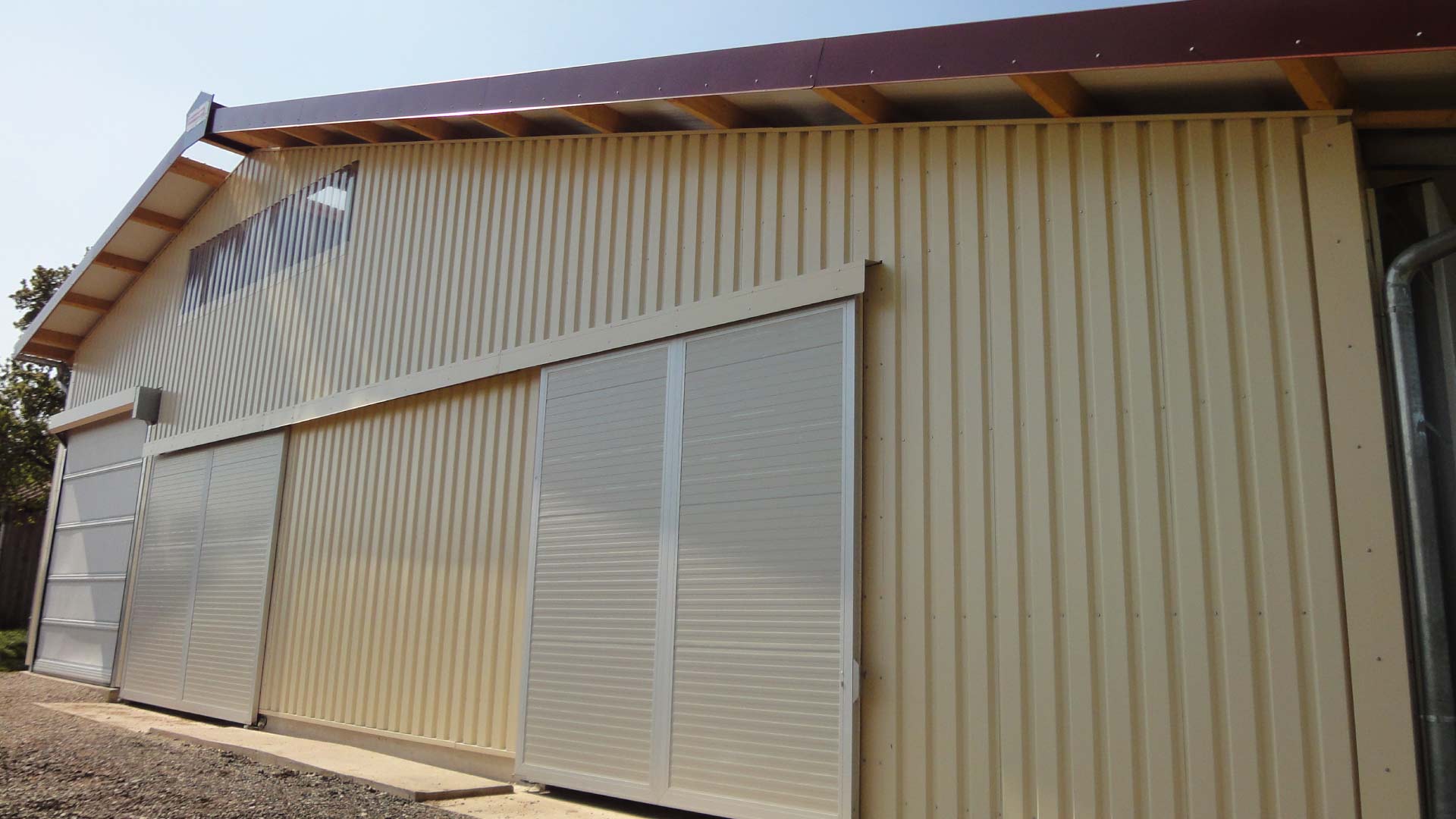 Warehouse doors with aluminium panels - NIKO - HELM HELLAS SA